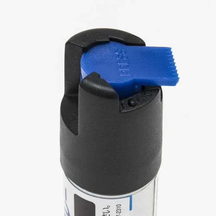 Unlock and press the part marked "PRESS" on the spray button to discharge.